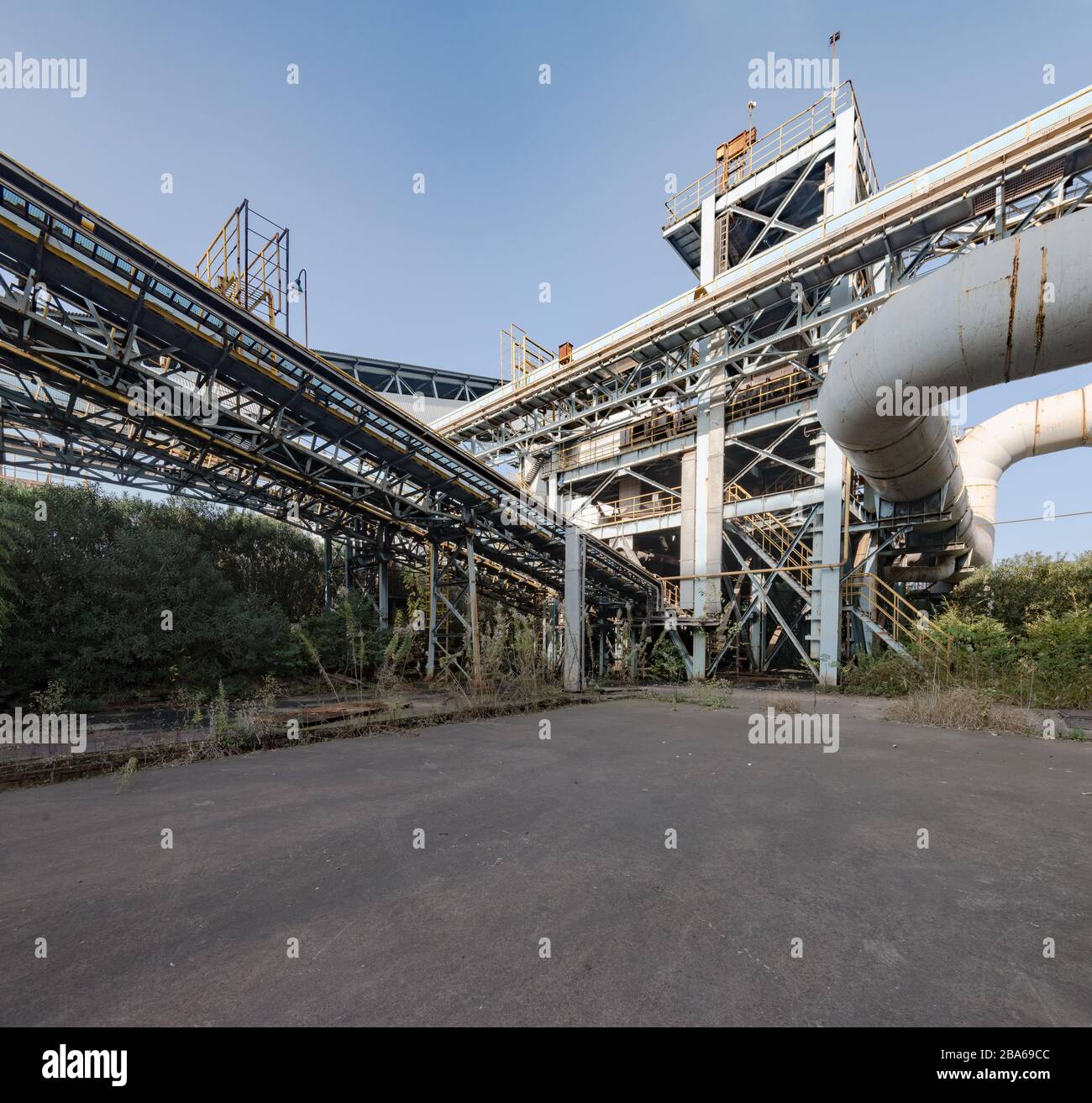 Interior of an old abandoned industrial steel factory Stock Photo - Alamy