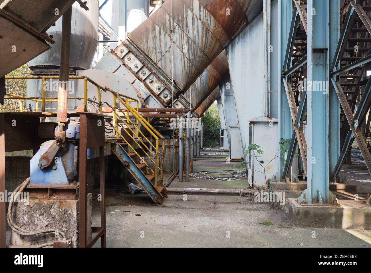 Interior of an old abandoned industrial steel factory Stock Photo - Alamy