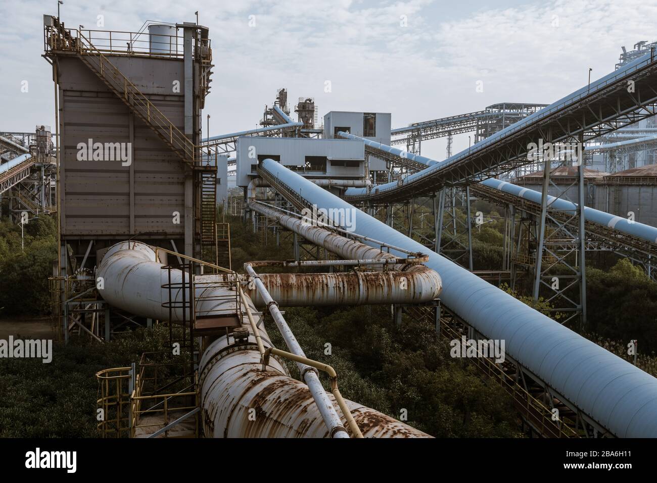 Interior of an old abandoned industrial steel factory Stock Photo - Alamy