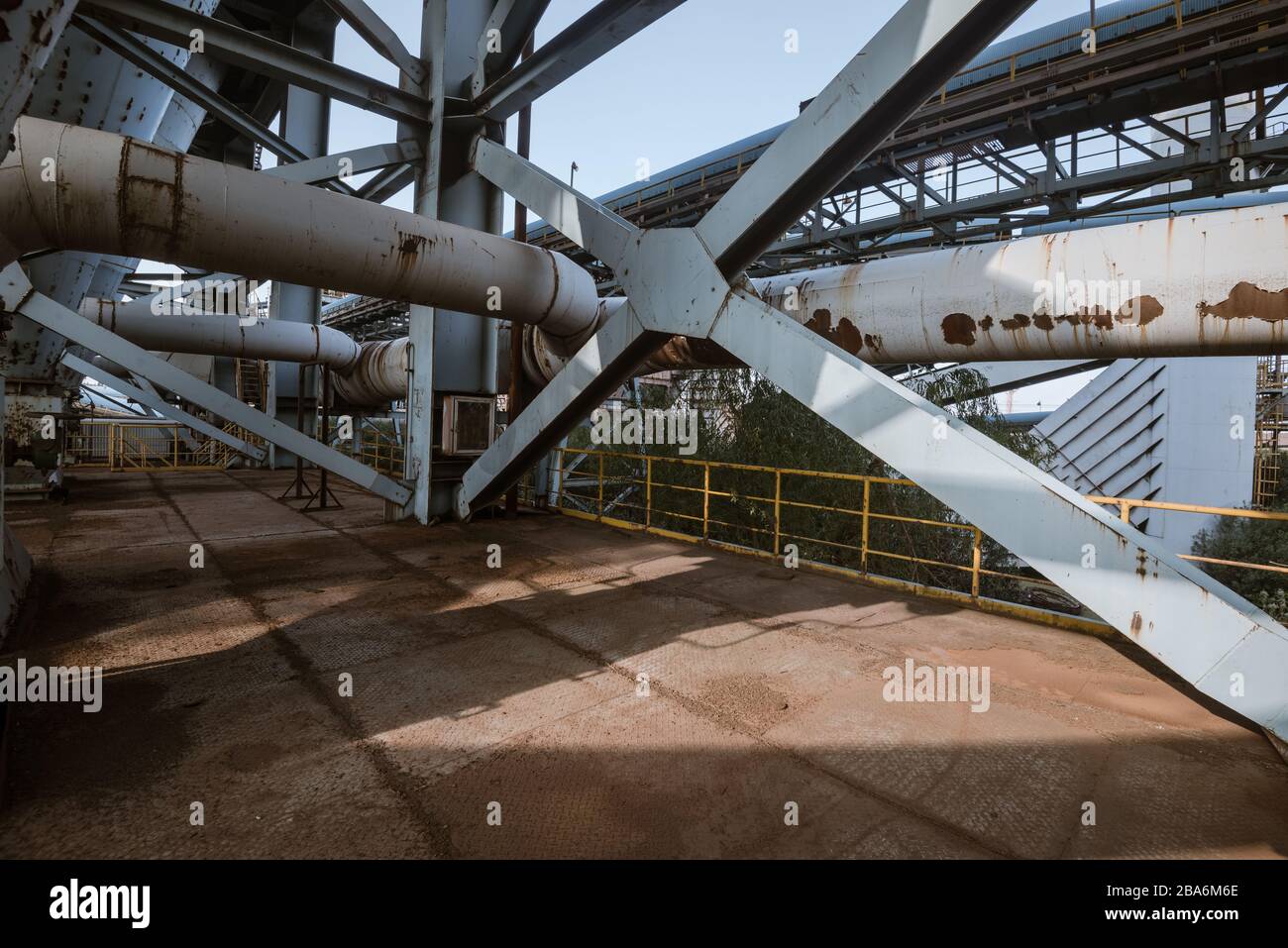 Interior of an old abandoned industrial steel factory Stock Photo - Alamy