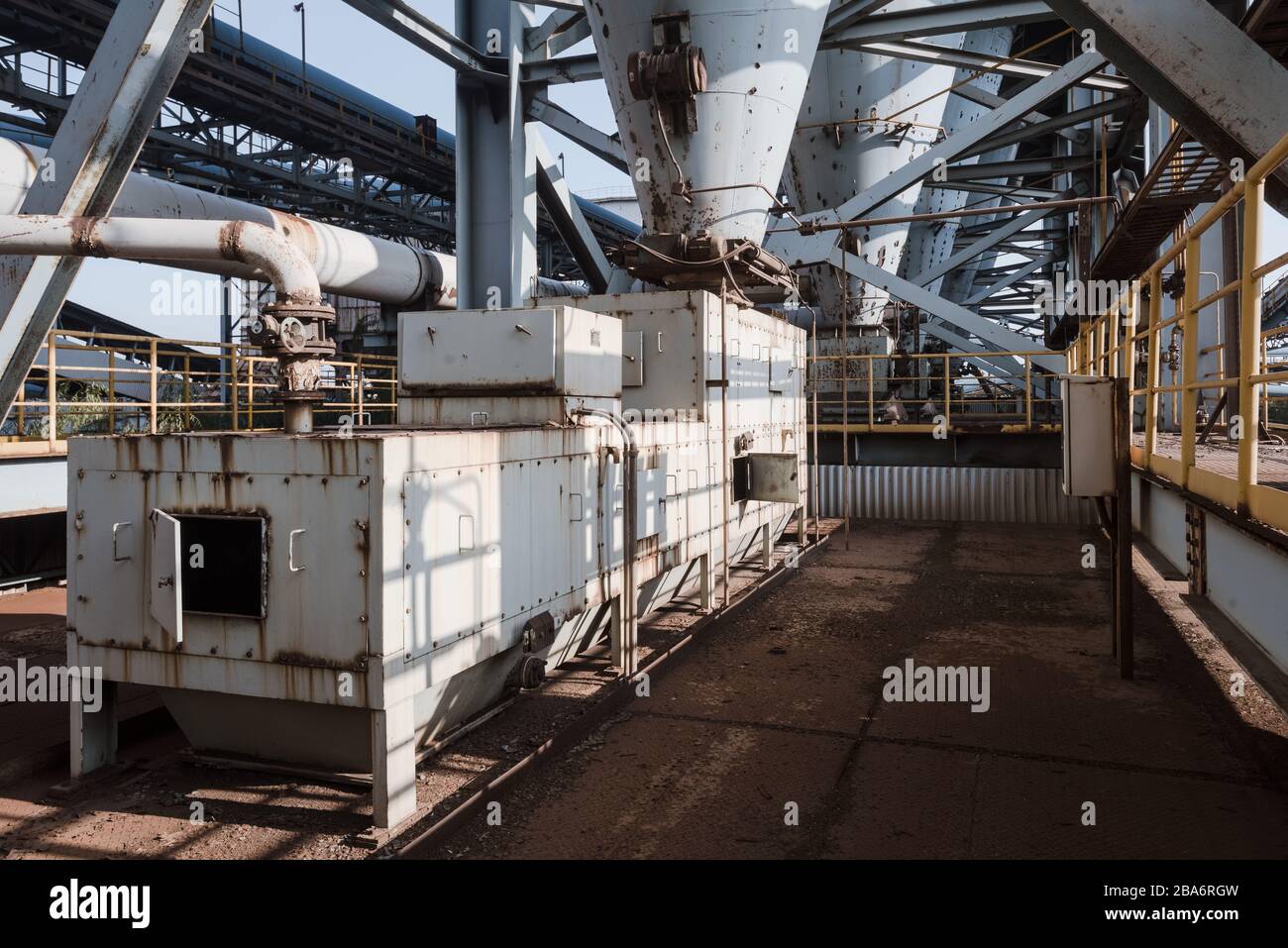 Interior of an old abandoned industrial steel factory Stock Photo - Alamy