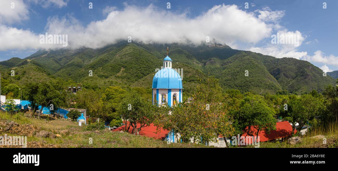 The Church to the Virgin del Chorrito, against mountains of the Sierra ...