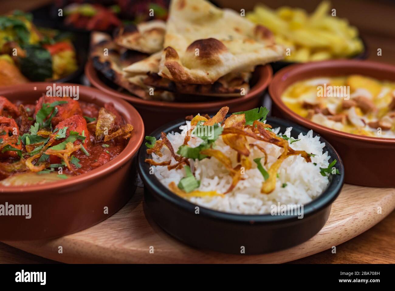 Indian style tapas curry selection which made with chicken, lamb ...