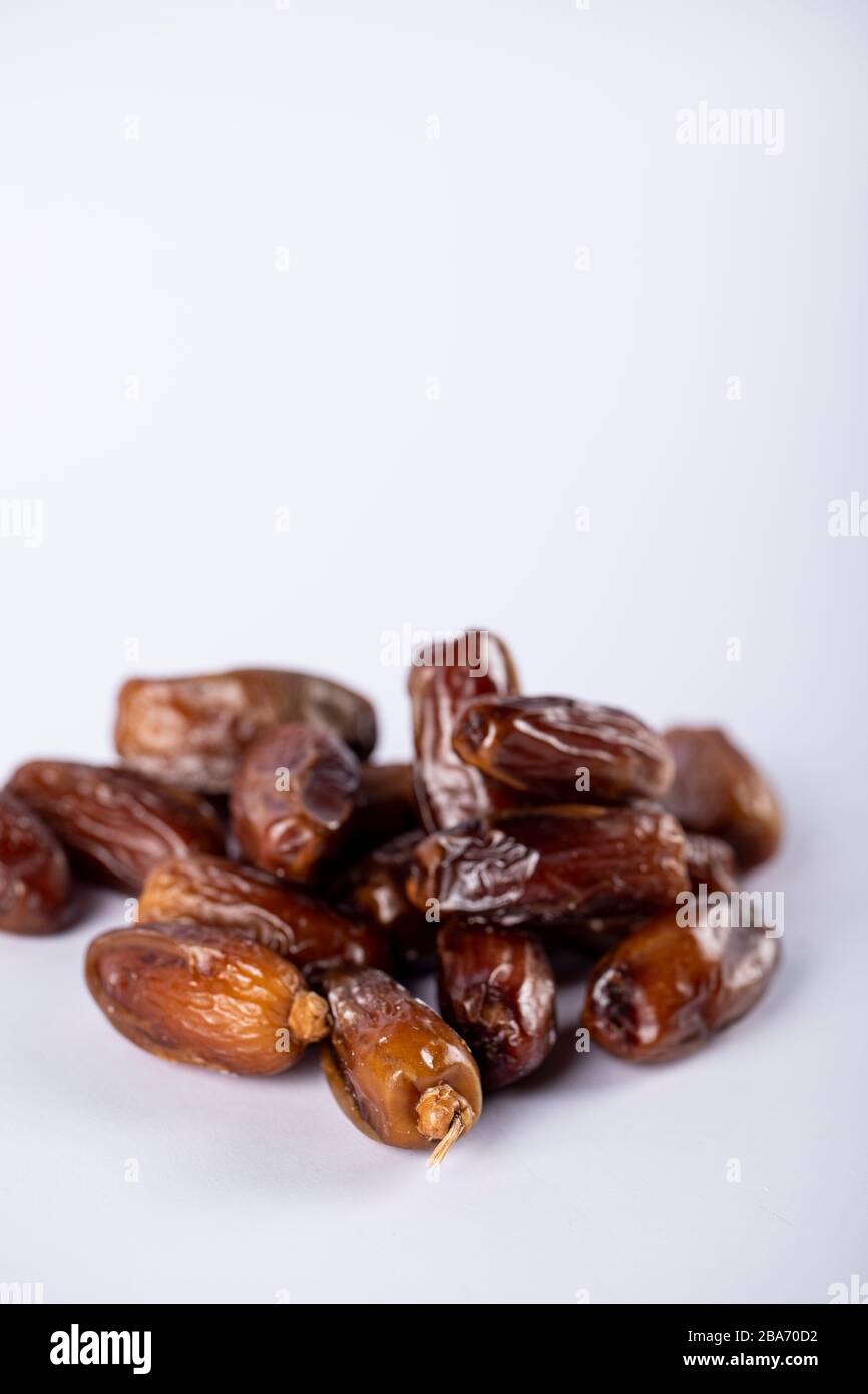 Eastern dates isolated on white backdrop Stock Photo - Alamy