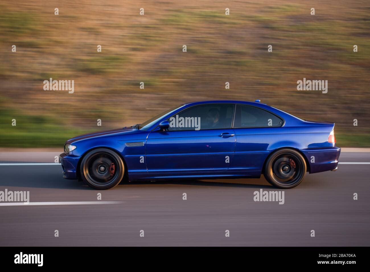 Blue sedan hi-res stock photography and images - Alamy