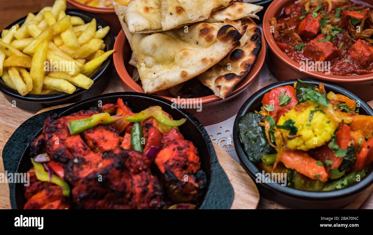 Indian style tapas curry selection which made with chicken, lamb ...