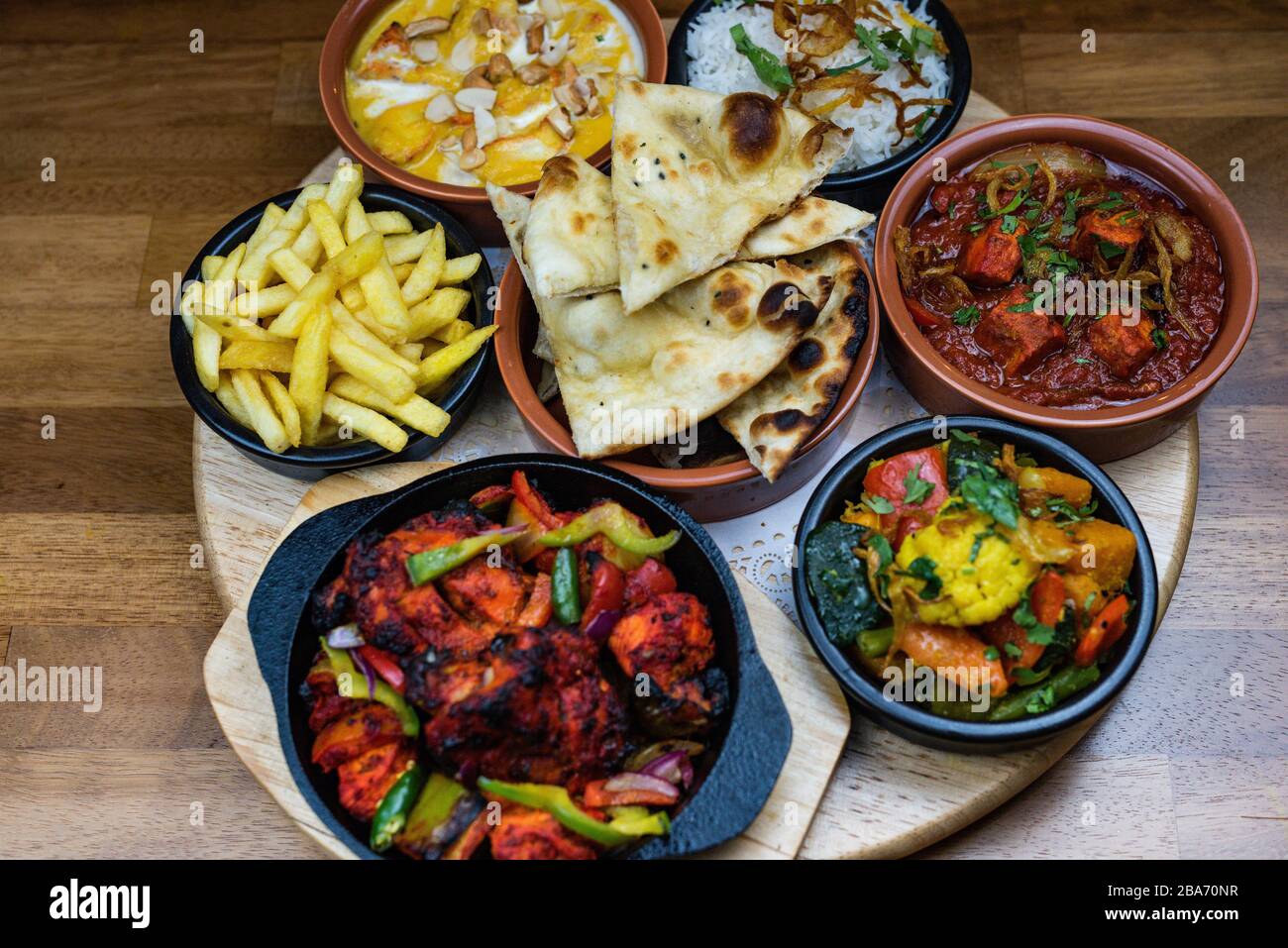 Indian style tapas curry selection which made with chicken, lamb ...