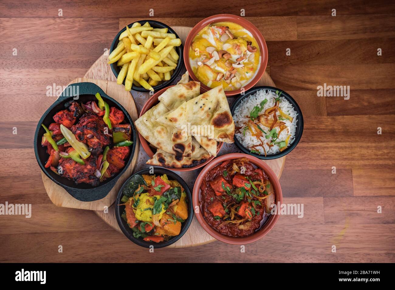 Indian style tapas curry selection which made with chicken, lamb ...