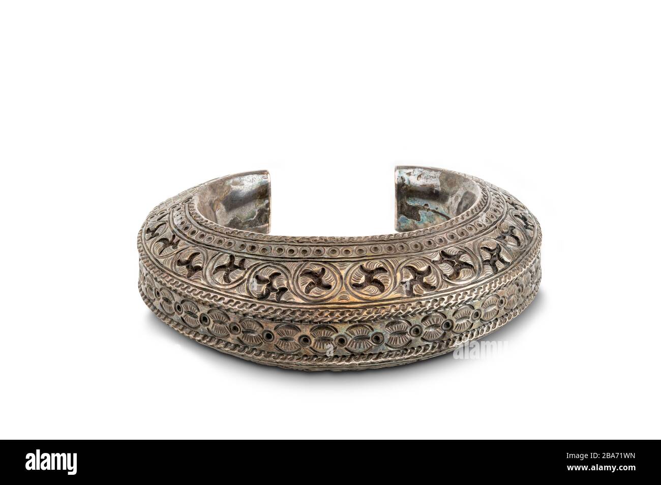 Thai style ancient handcrafted silver bracelet on white background with ...