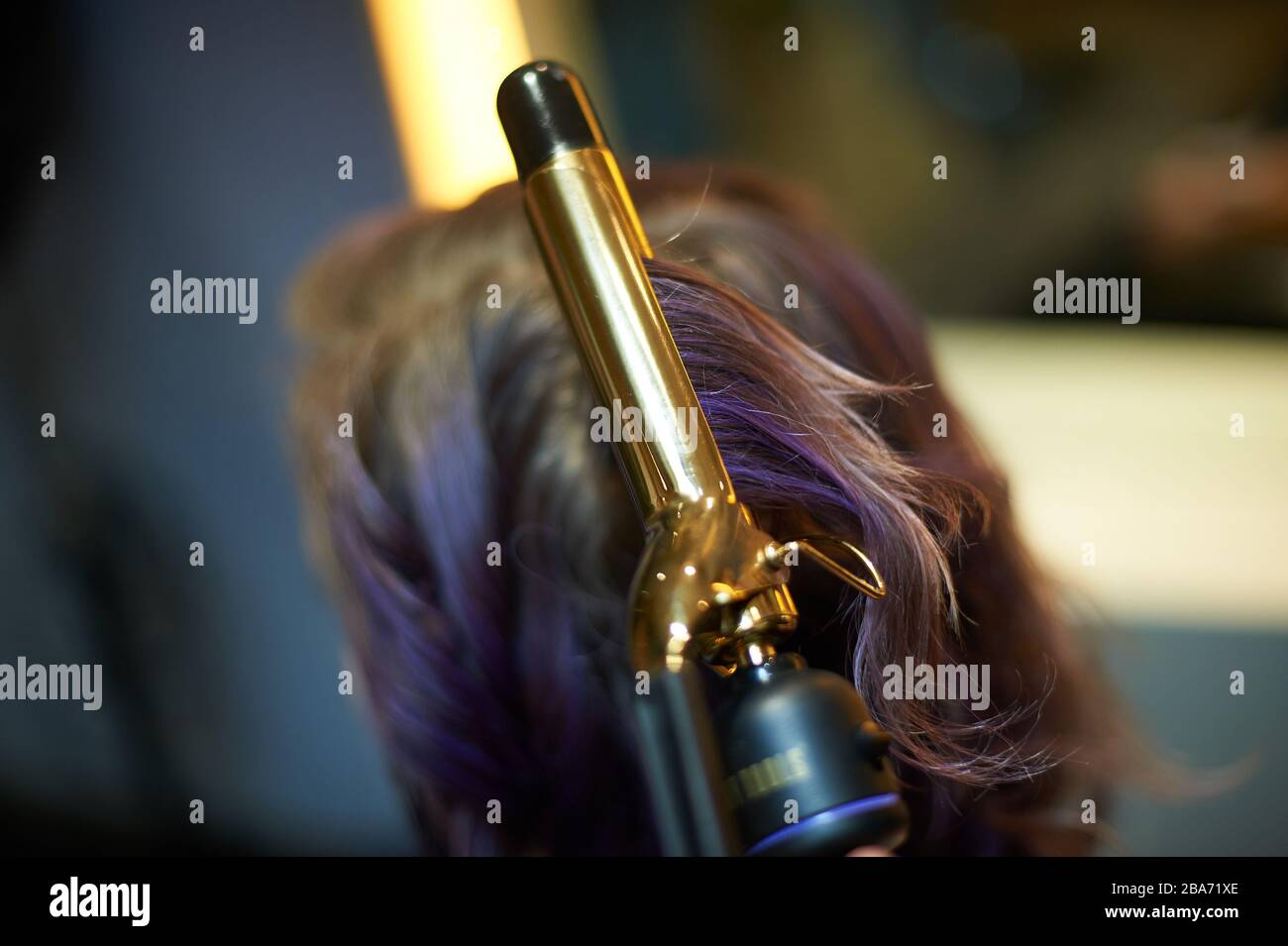 Cutting and coloring hair at a salon Stock Photo - Alamy