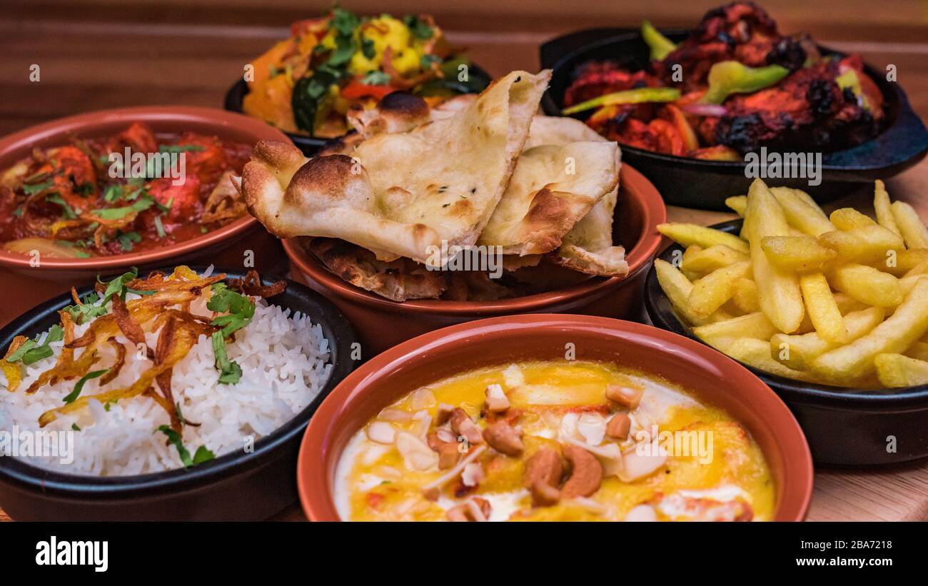 Indian style tapas curry selection which made with chicken, lamb ...