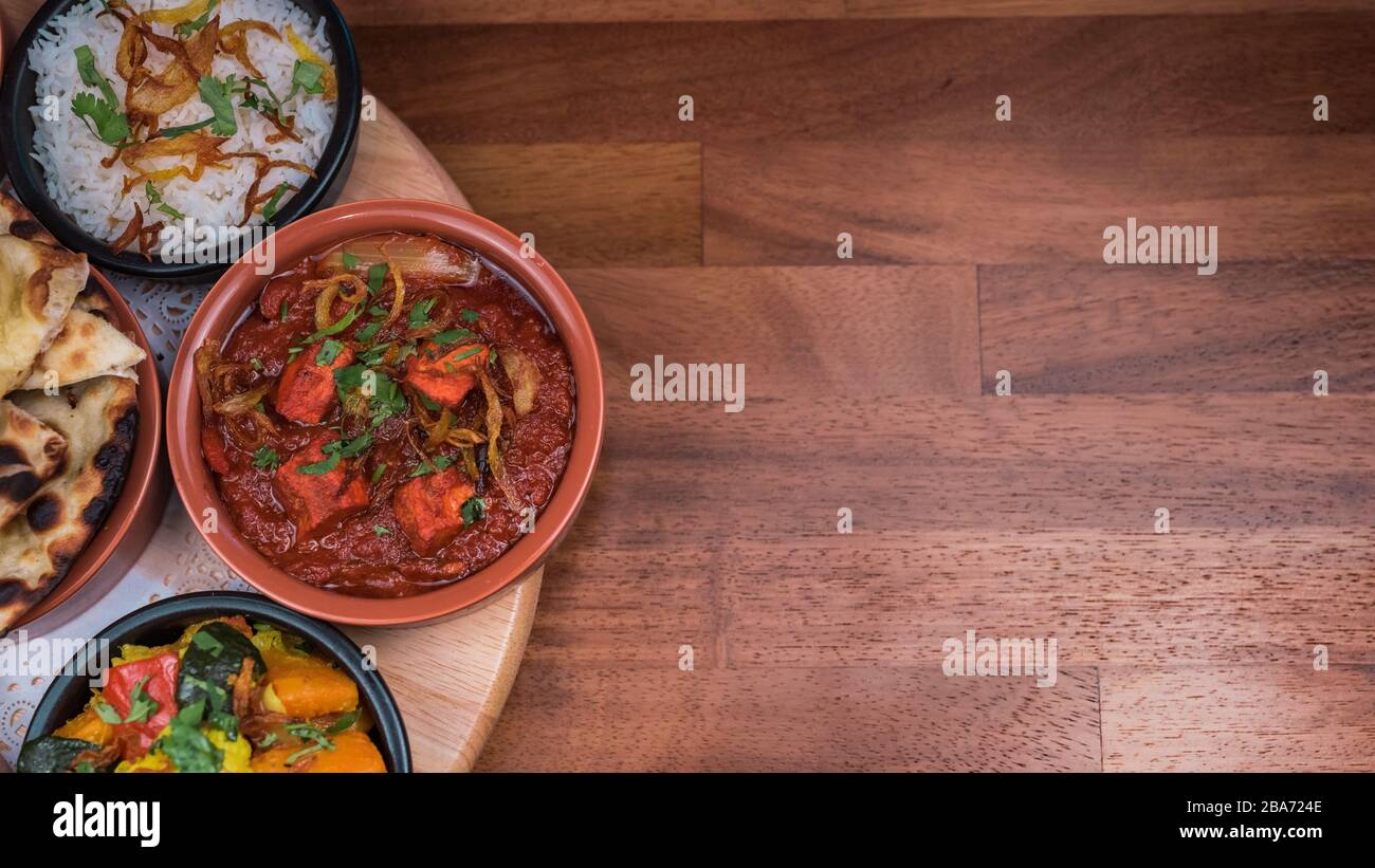 Indian style tapas curry selection which made with chicken, lamb ...