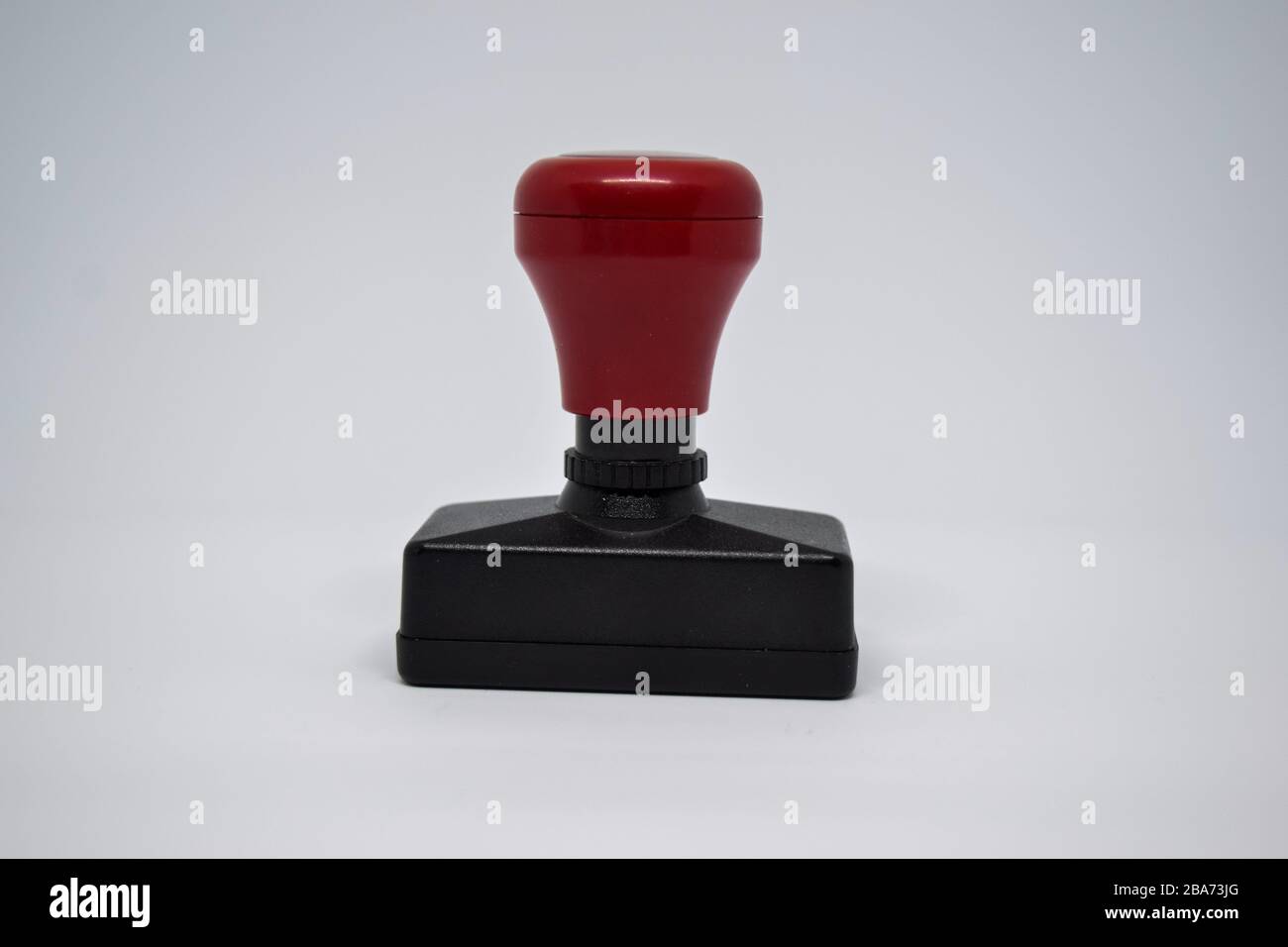 Close up Red Handle Rubber Stamper isolated on White Background Stock ...