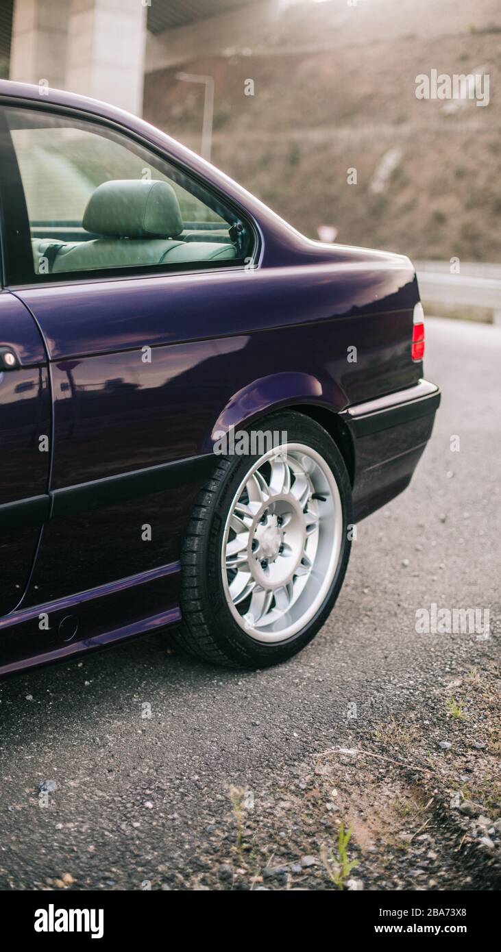 Back door and wheel of a sedan car Stock Photo - Alamy