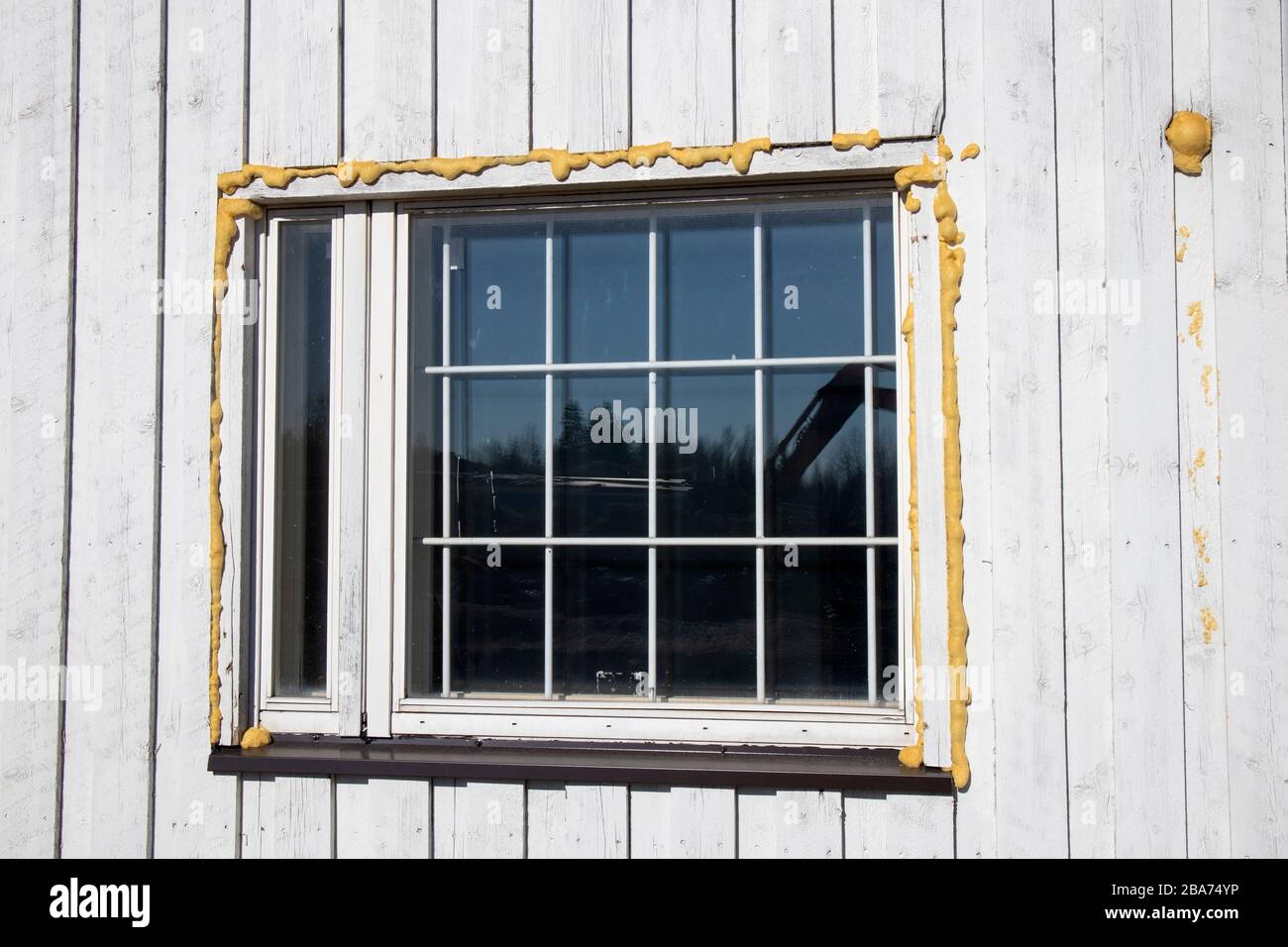 window insulation with polyurethane foam Stock Photo - Alamy