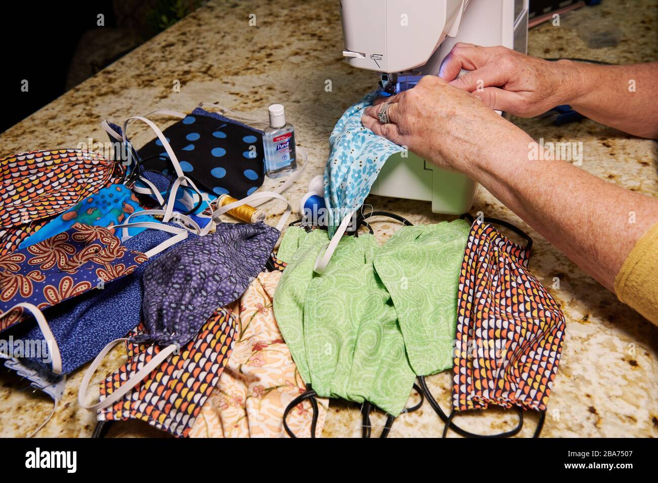 Volunteer sewing masks for healthcare workers Stock Photo - Alamy