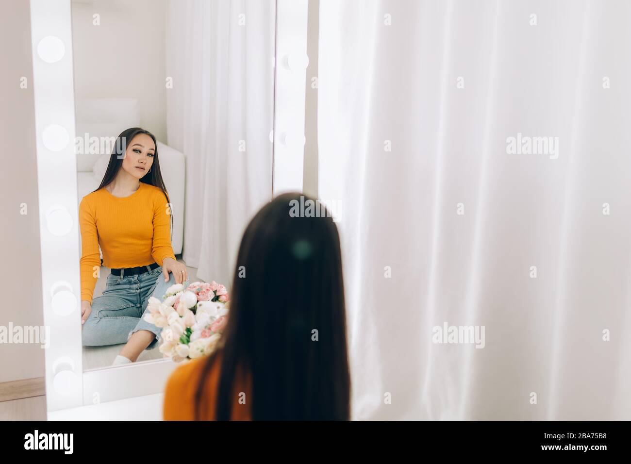 girl sitting in front of mirror Stock Photo - Alamy