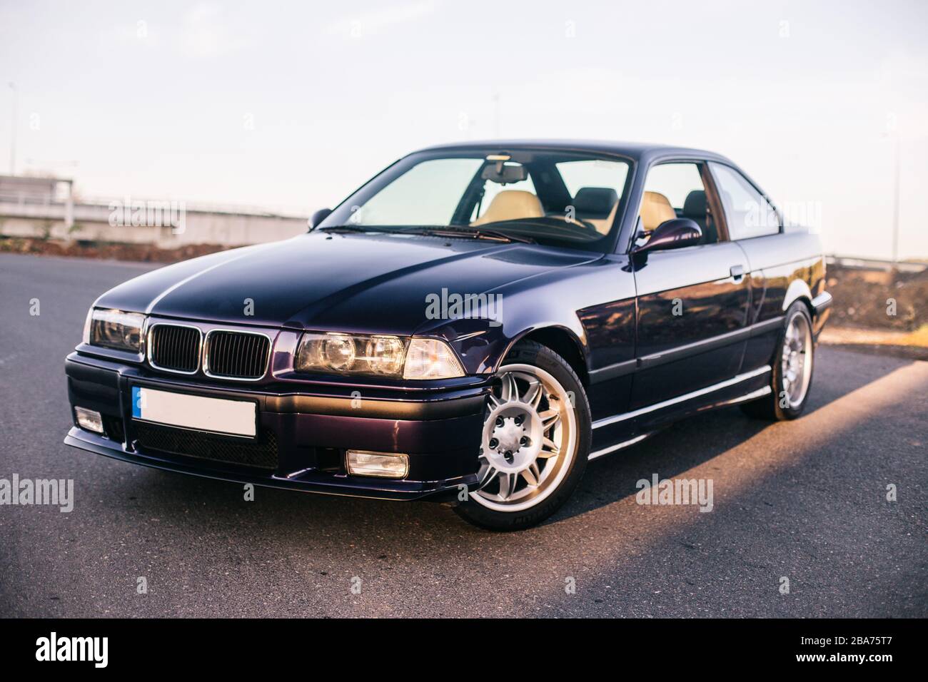 Black old model sedan car parked on the highway Stock Photo - Alamy