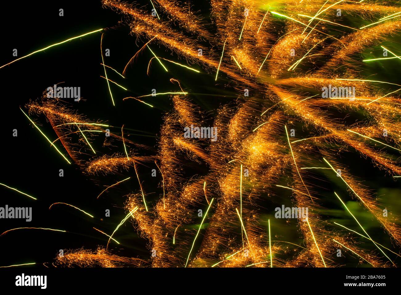 Colorful fireworks explode at night Stock Photo - Alamy