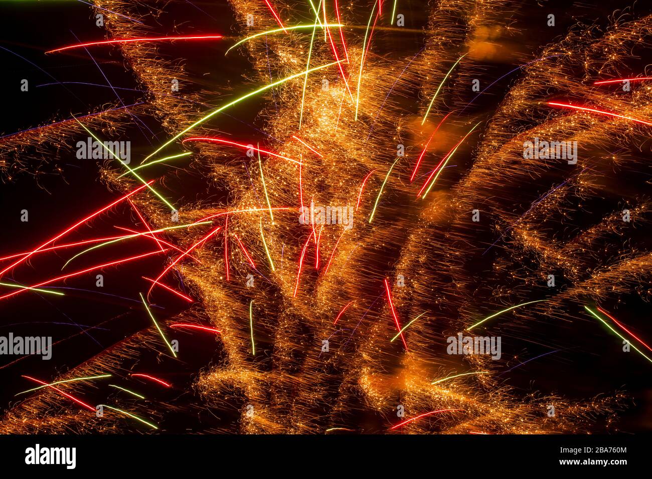 Colorful fireworks explode at night Stock Photo - Alamy
