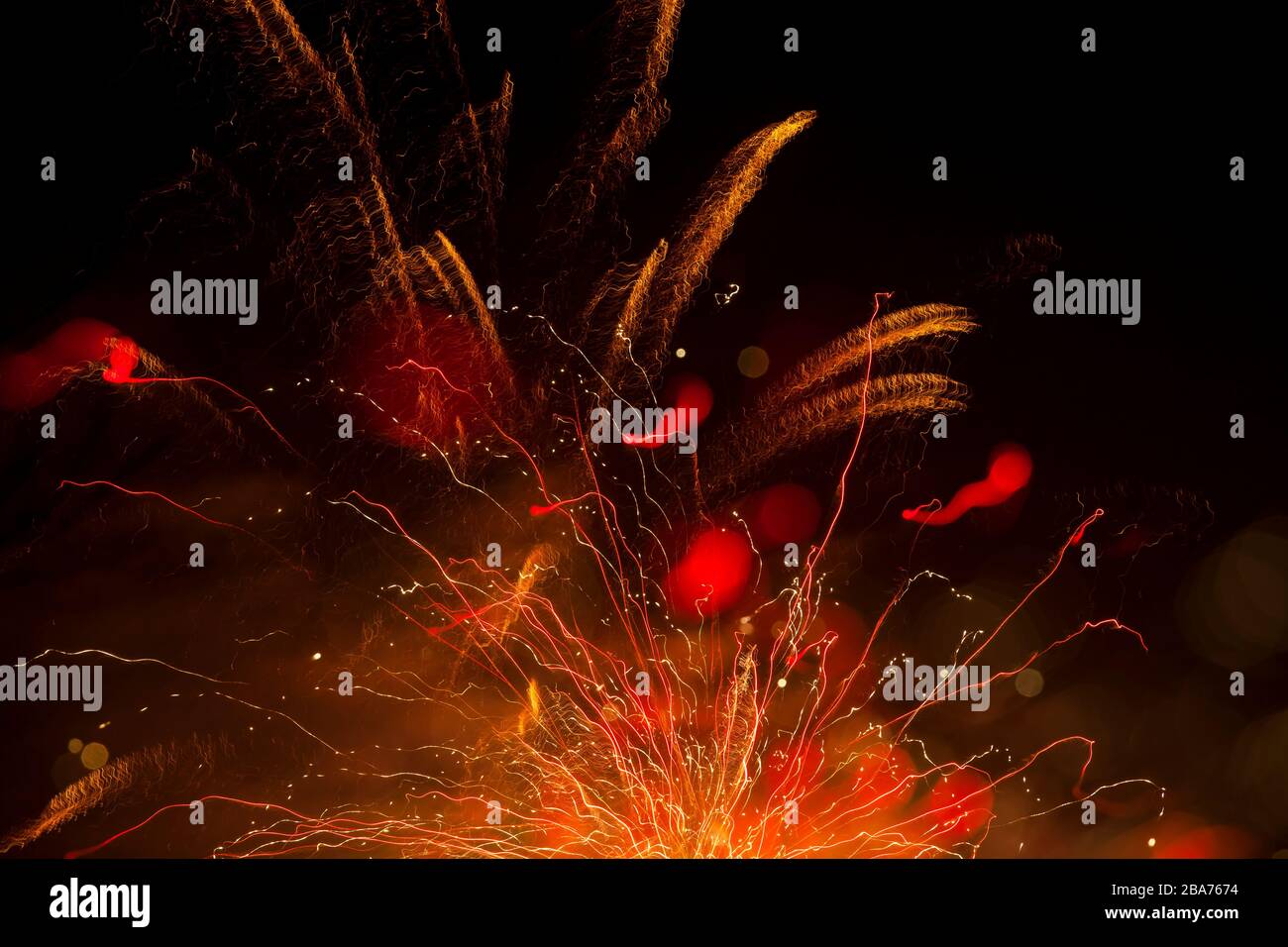 Colorful fireworks explode at night Stock Photo - Alamy