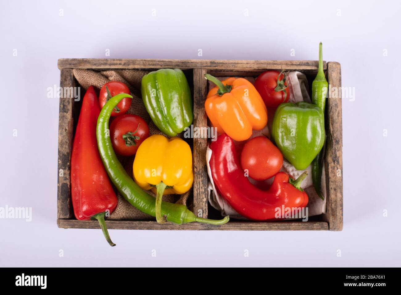 Color peppers tray in white. Top view Stock Photo - Alamy