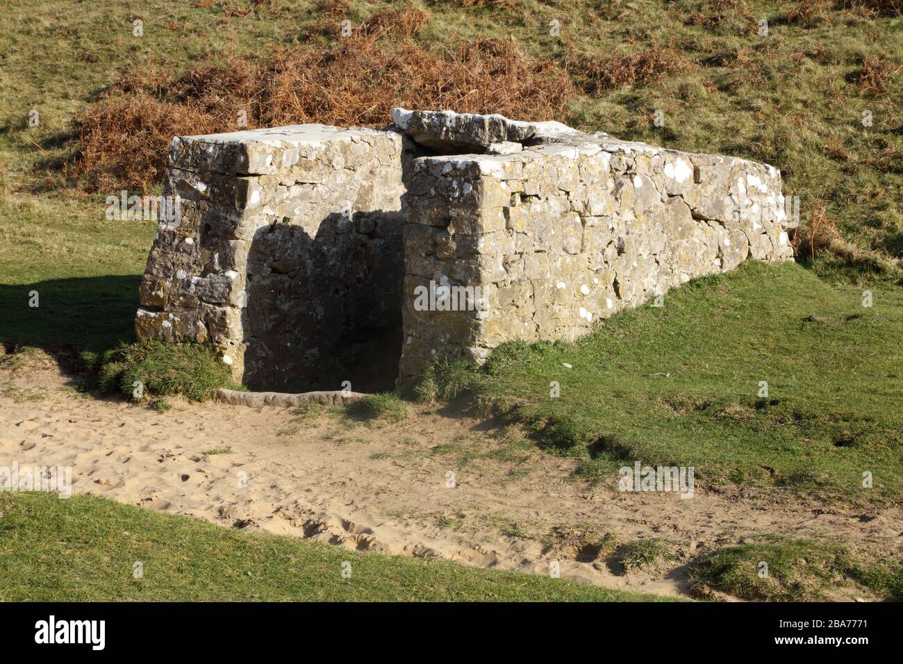 A remote stone built lookout post in the base of a valley discretely ...