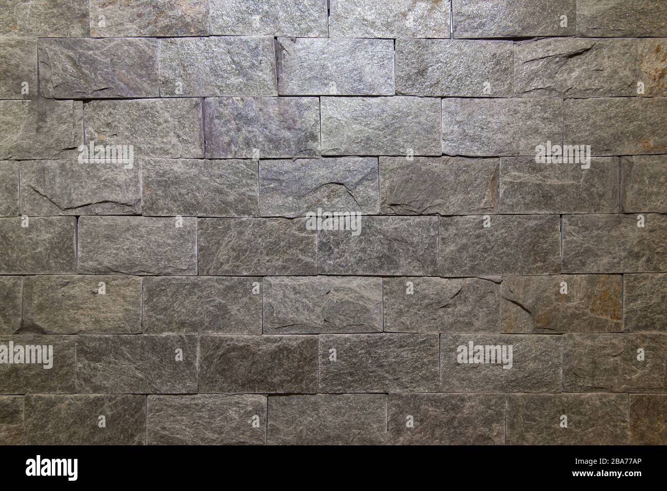 Background of stone wall texture abstract for design Stock Photo - Alamy
