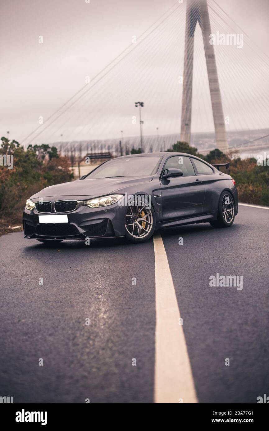 Black luxury sport car advertisement shooting Stock Photo - Alamy