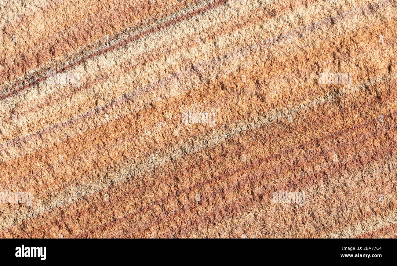Orange sandstone texture with light and dark veins Stock Photo - Alamy