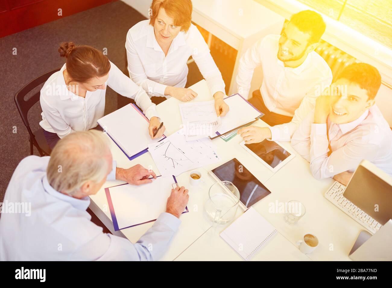 Business table hi-res stock photography and images - Alamy