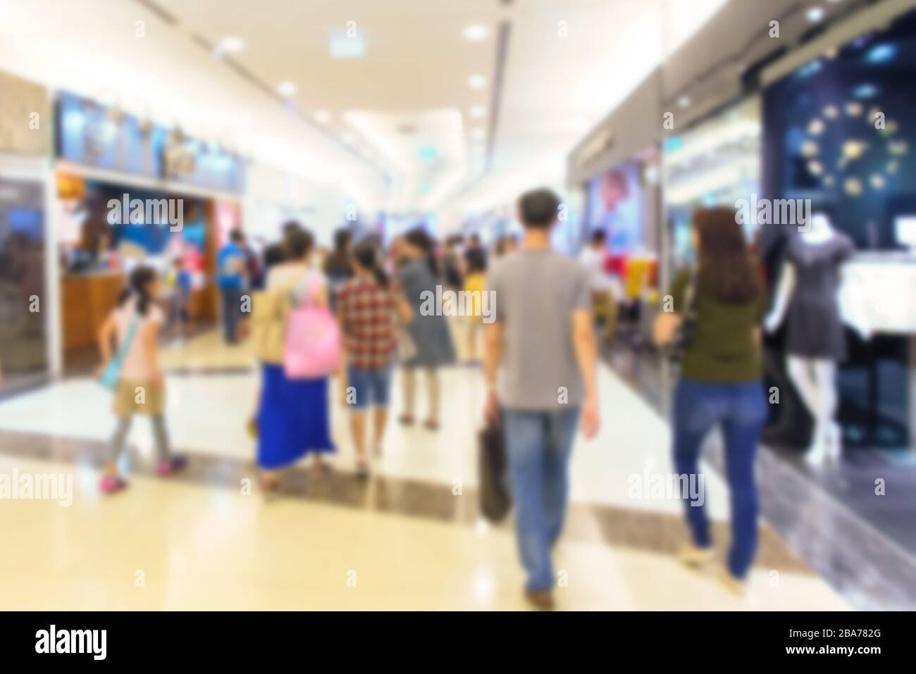 blur People Walking in the corridor of business center Stock Photo - Alamy