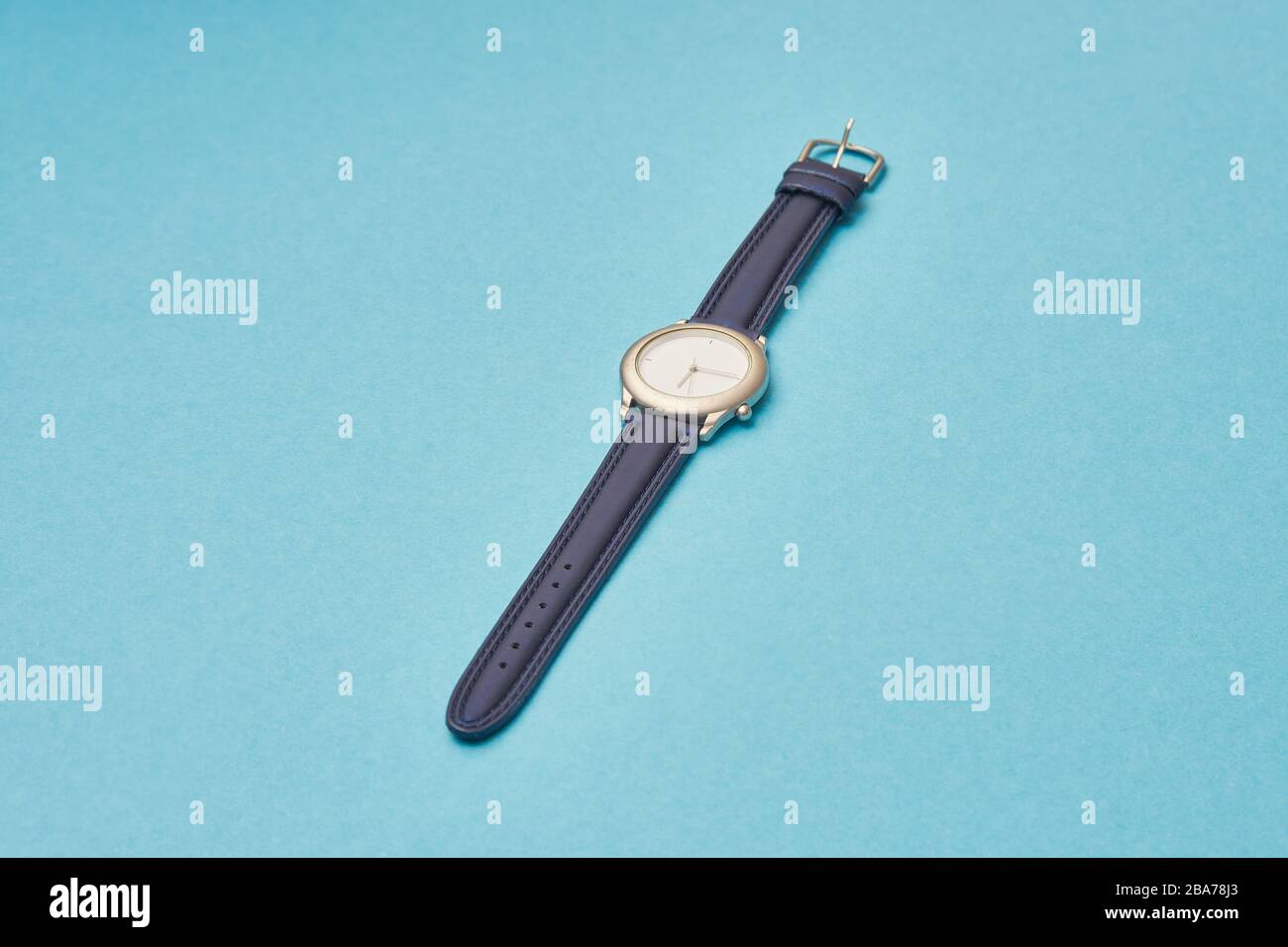 new watch with a leather strap with arrows on the dial time 6:15. blue ...