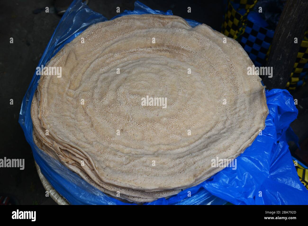 Injeras ( Teff flour flatbread ) sold in the Waliso market in Oromia ...