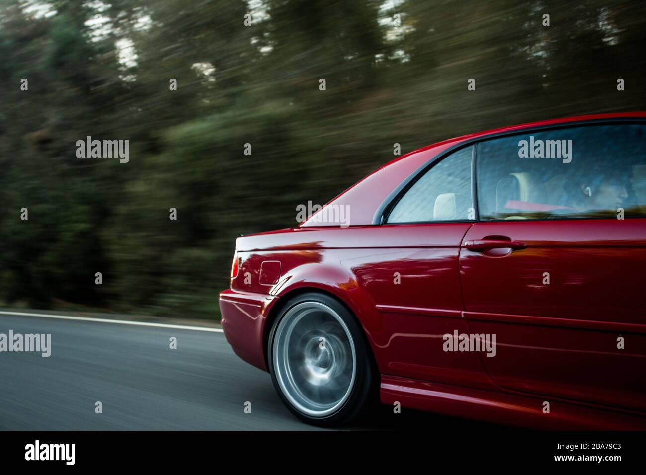 Back right door and wheel of a red sedan Stock Photo - Alamy