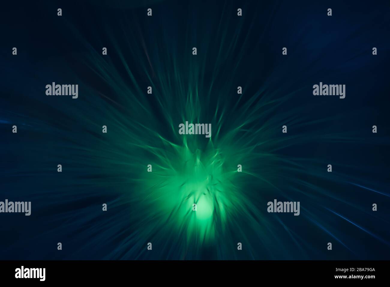 Beautiful abstract green collapse background on a dark Stock Photo - Alamy