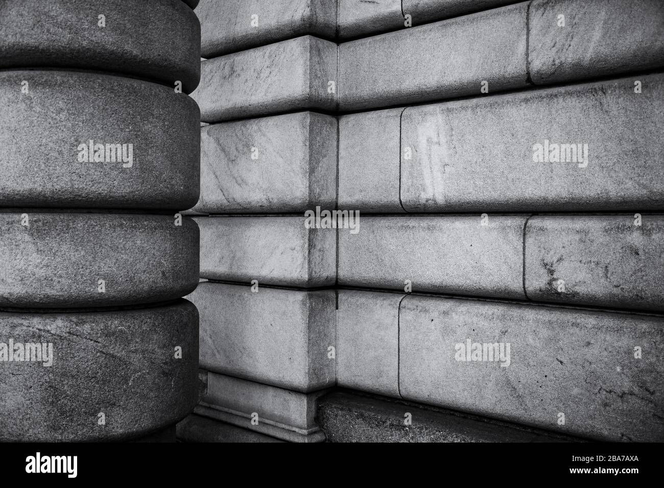 Greyscale shot of a textured wall of a modern building Stock Photo - Alamy