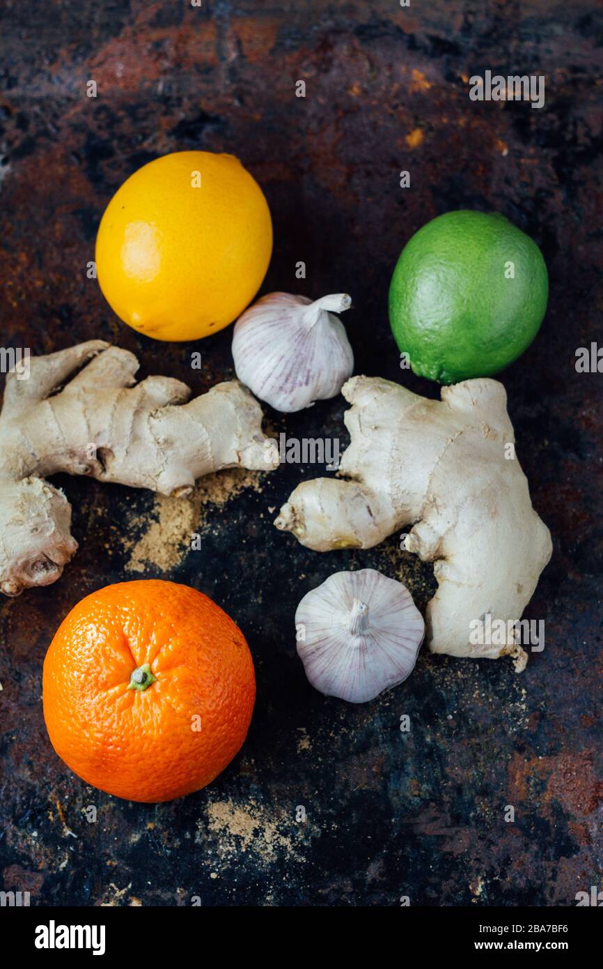 Citrus fruits with garlic and ginger root Stock Photo - Alamy