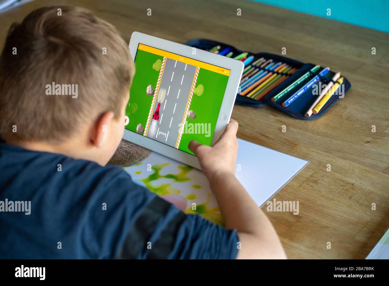 Joel does his homework on the ipad at home and is allowed to play a ...