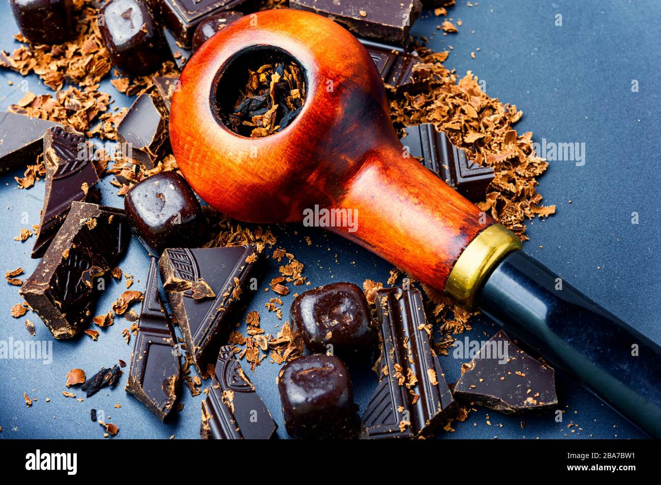 Chocolate flavored tobacco for smoking pipes.Tobacco pipe filled with ...