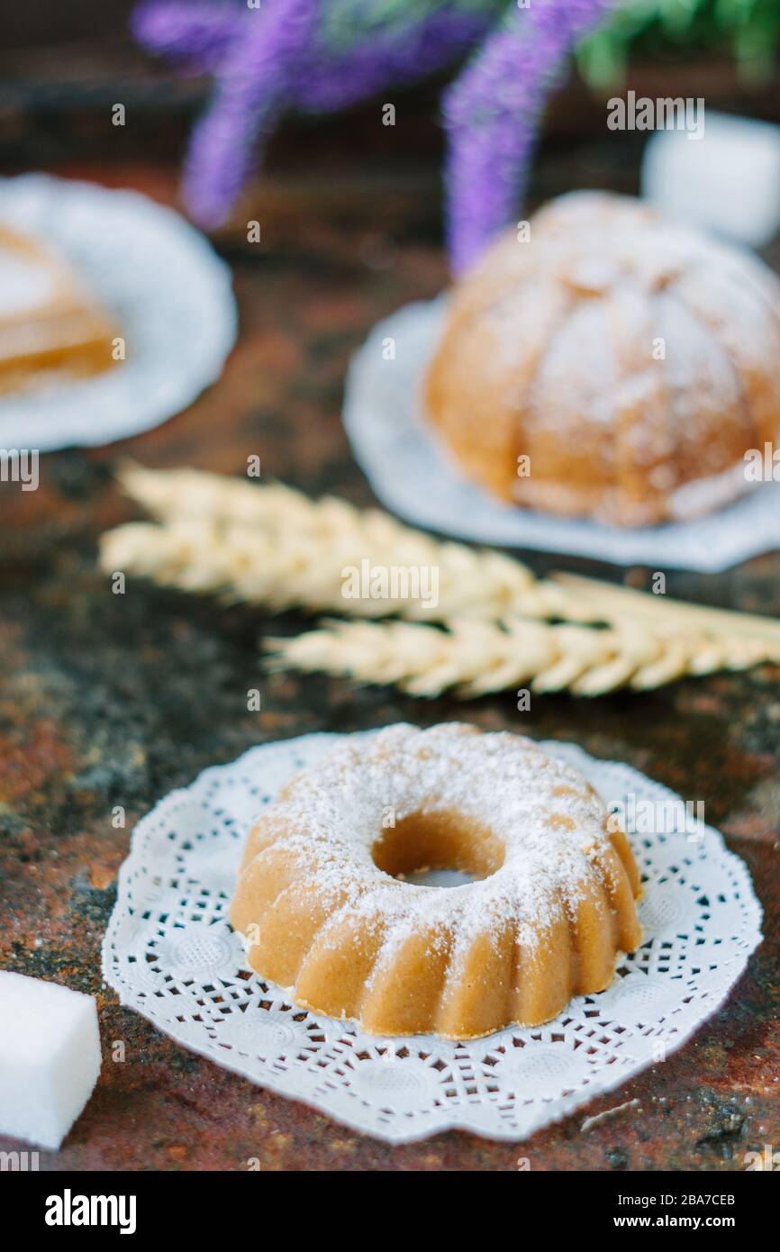 Sweet cake in form of circle over rustic surface Stock Photo - Alamy