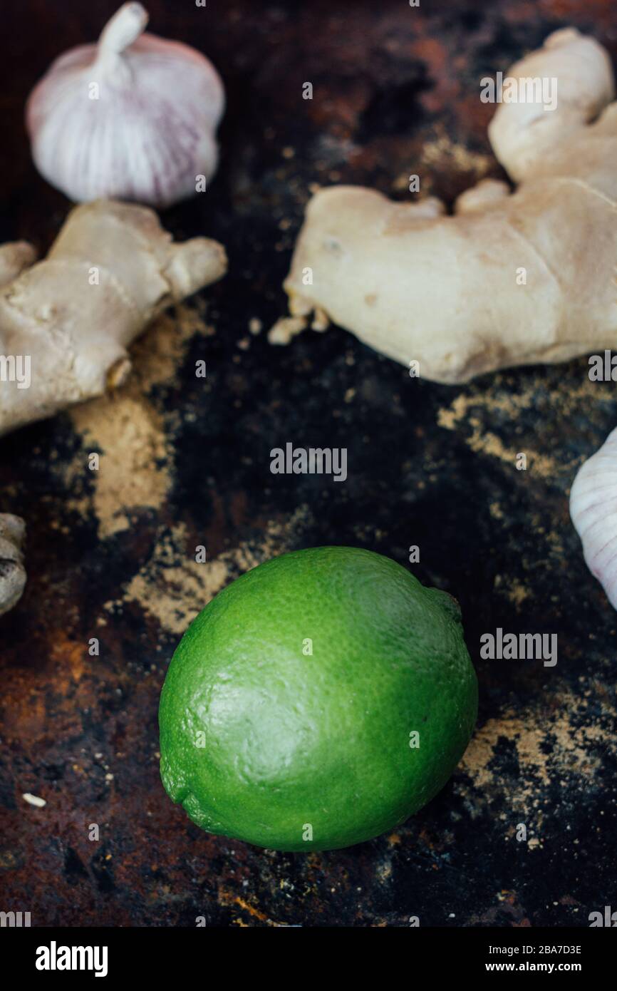 Citrus fruits with garlic and ginger root Stock Photo - Alamy
