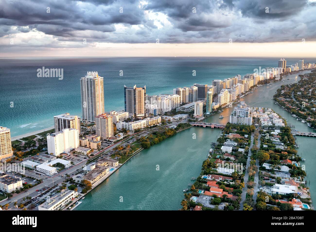 Skyscrapers of Miami Beach. Stunning aerial view at sunset with cloudy ...