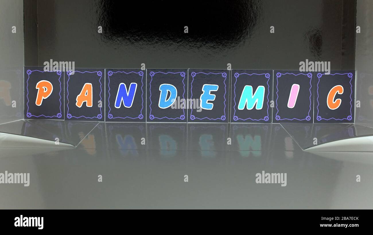 pandemic composed with colored cardboard letters Stock Photo - Alamy