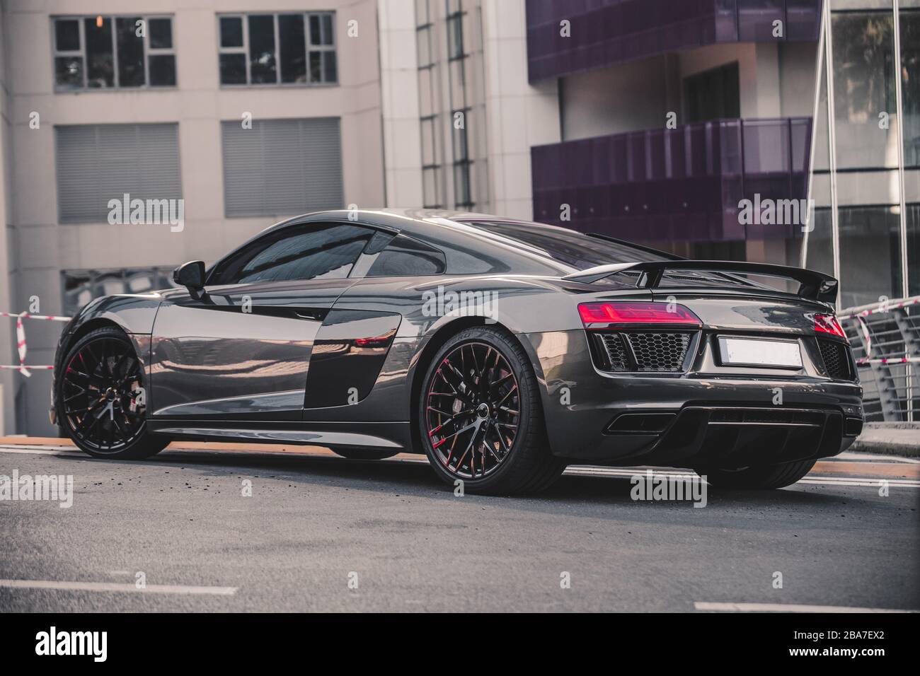Bronze color sport car with black tuning Stock Photo - Alamy