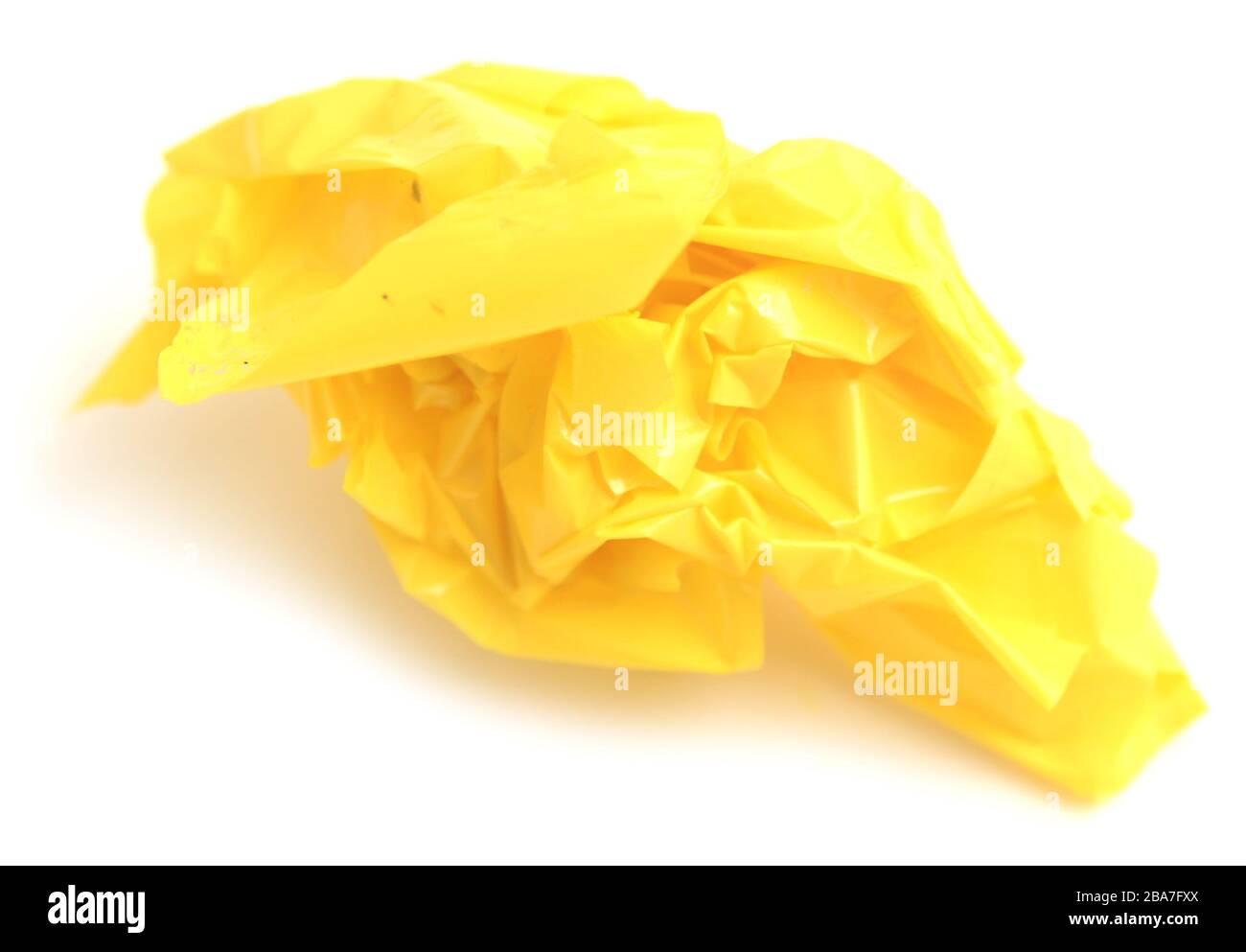 Crumpled yellow tapes isolated on white Stock Photo - Alamy
