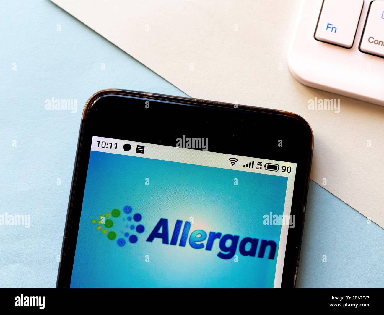 In this photo illustration Allergan Plc. logo is seen displayed on a ...