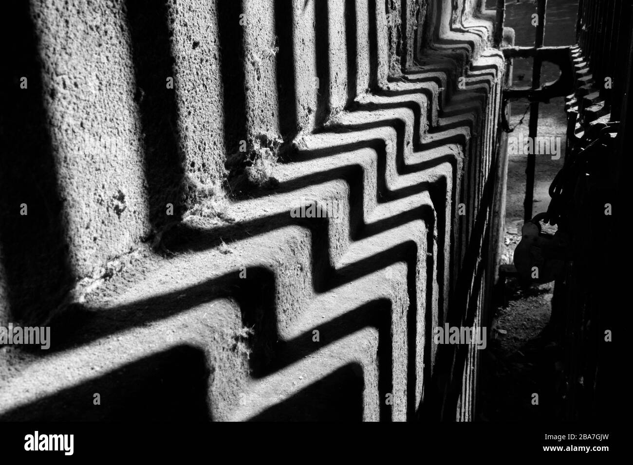 Sun and shadows play zigzag in the arch below the Serpentine Bridge ...