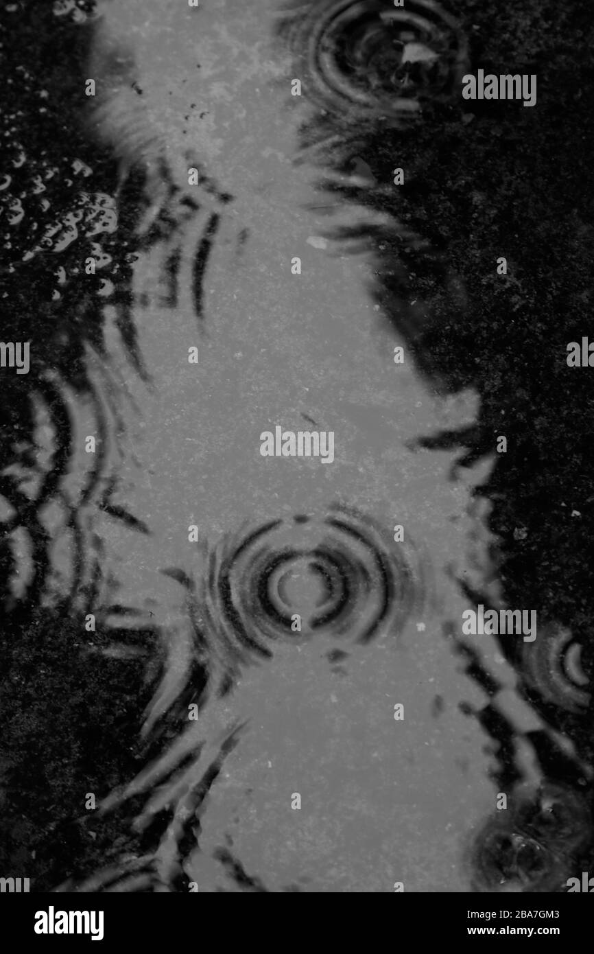 Puddle raindrop hi-res stock photography and images - Alamy