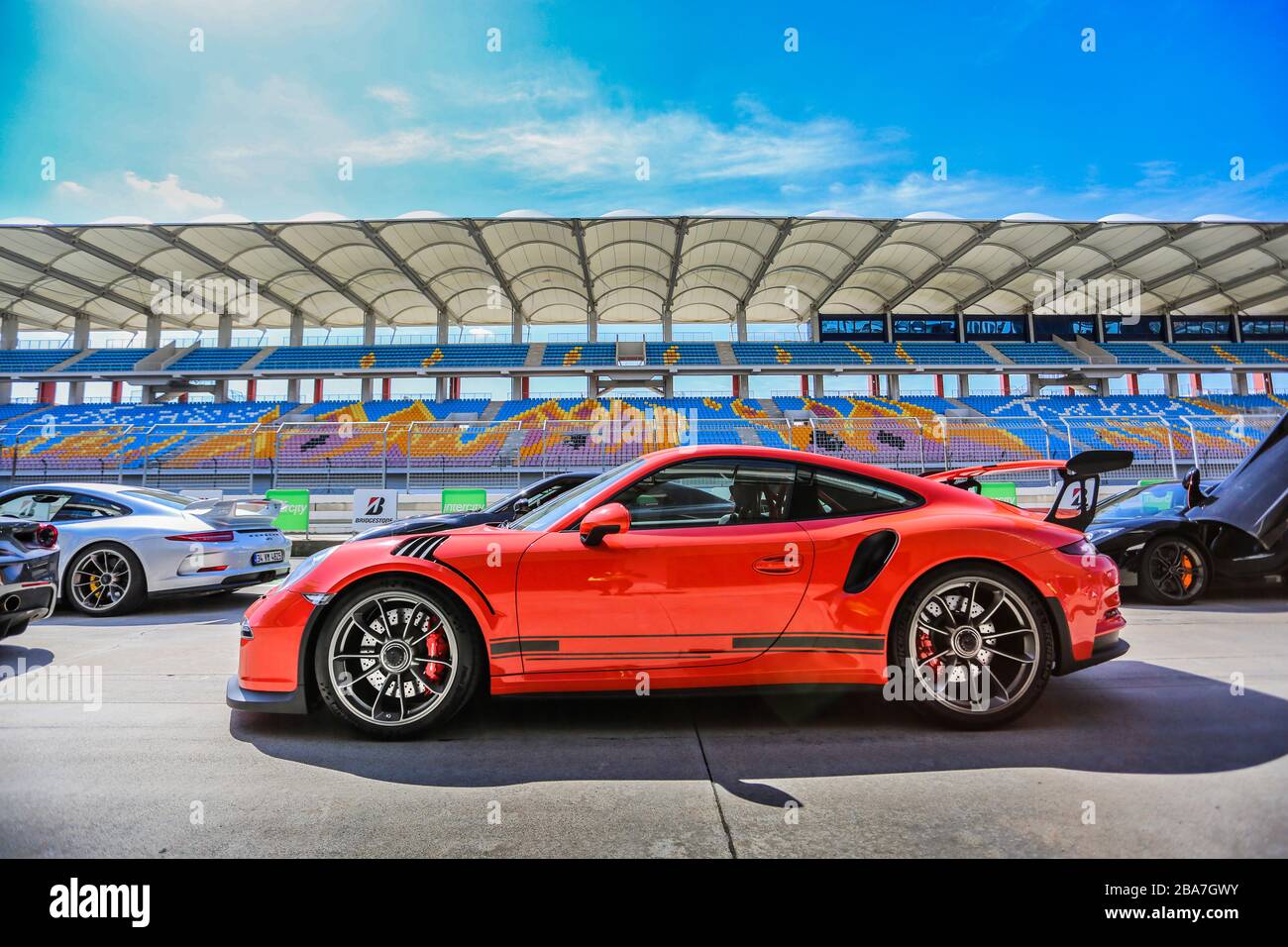 Sport cars race in the trace of a stadium Stock Photo - Alamy